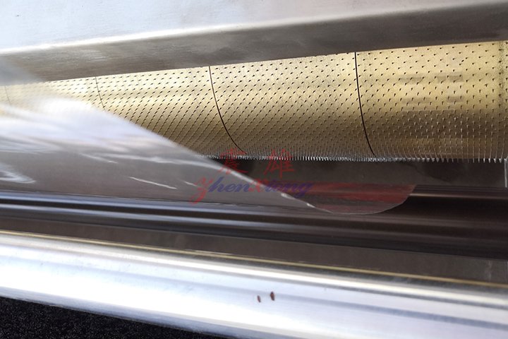 automatic-plastic-perforating-machine